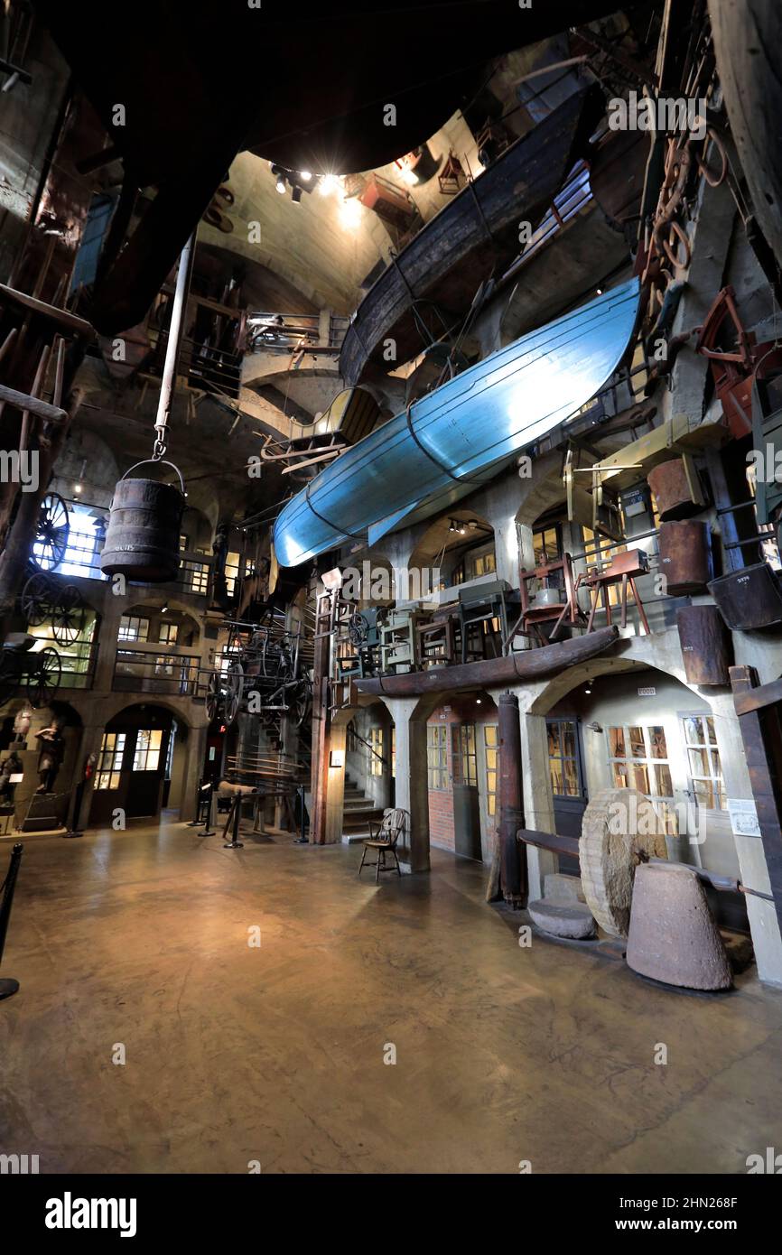 The interior view of Mercer Museum and Library with artifacts, tools ...