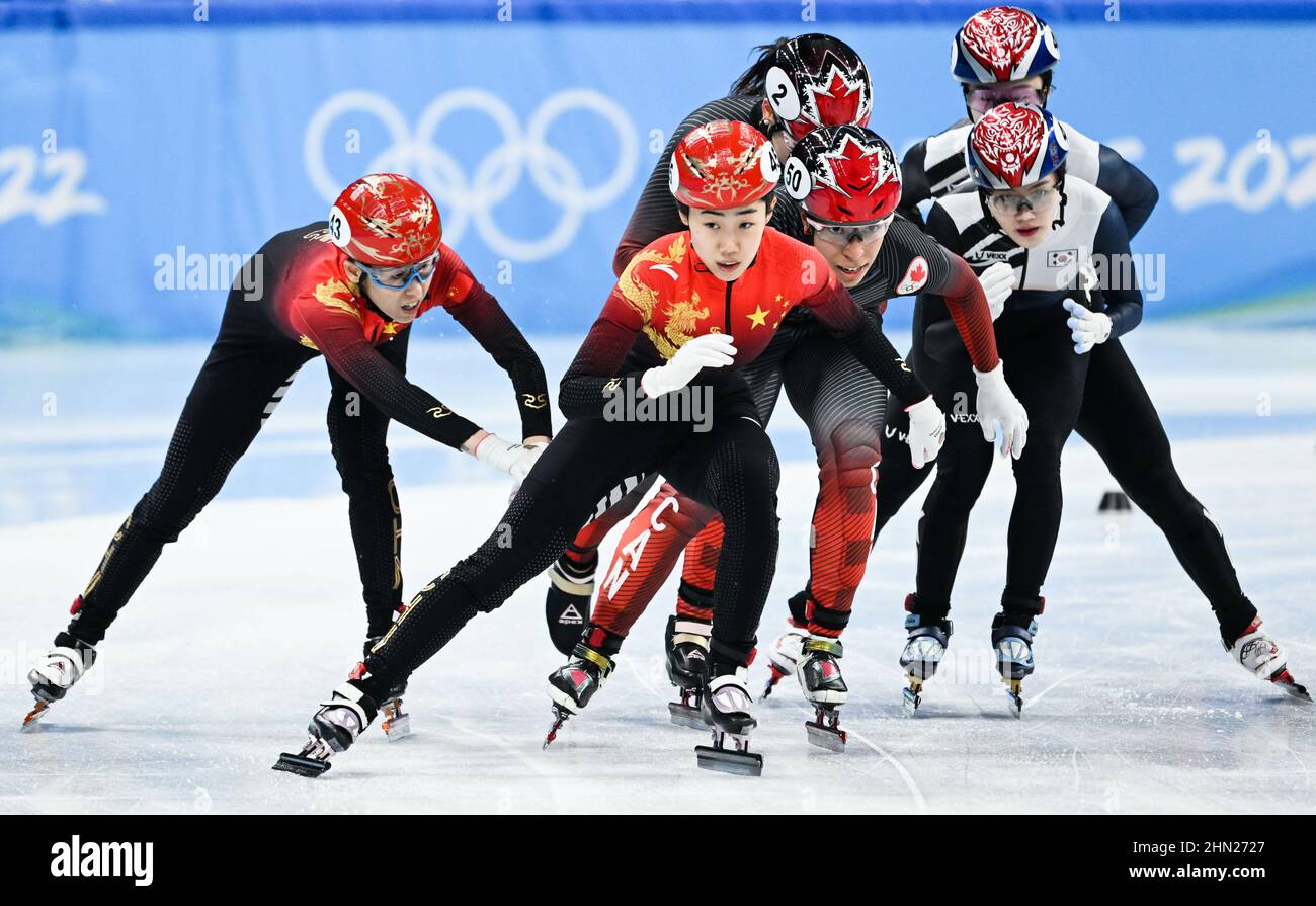 Beijing, China. 13th Feb, 2022. Zhang Yuting (front) of China competes ...