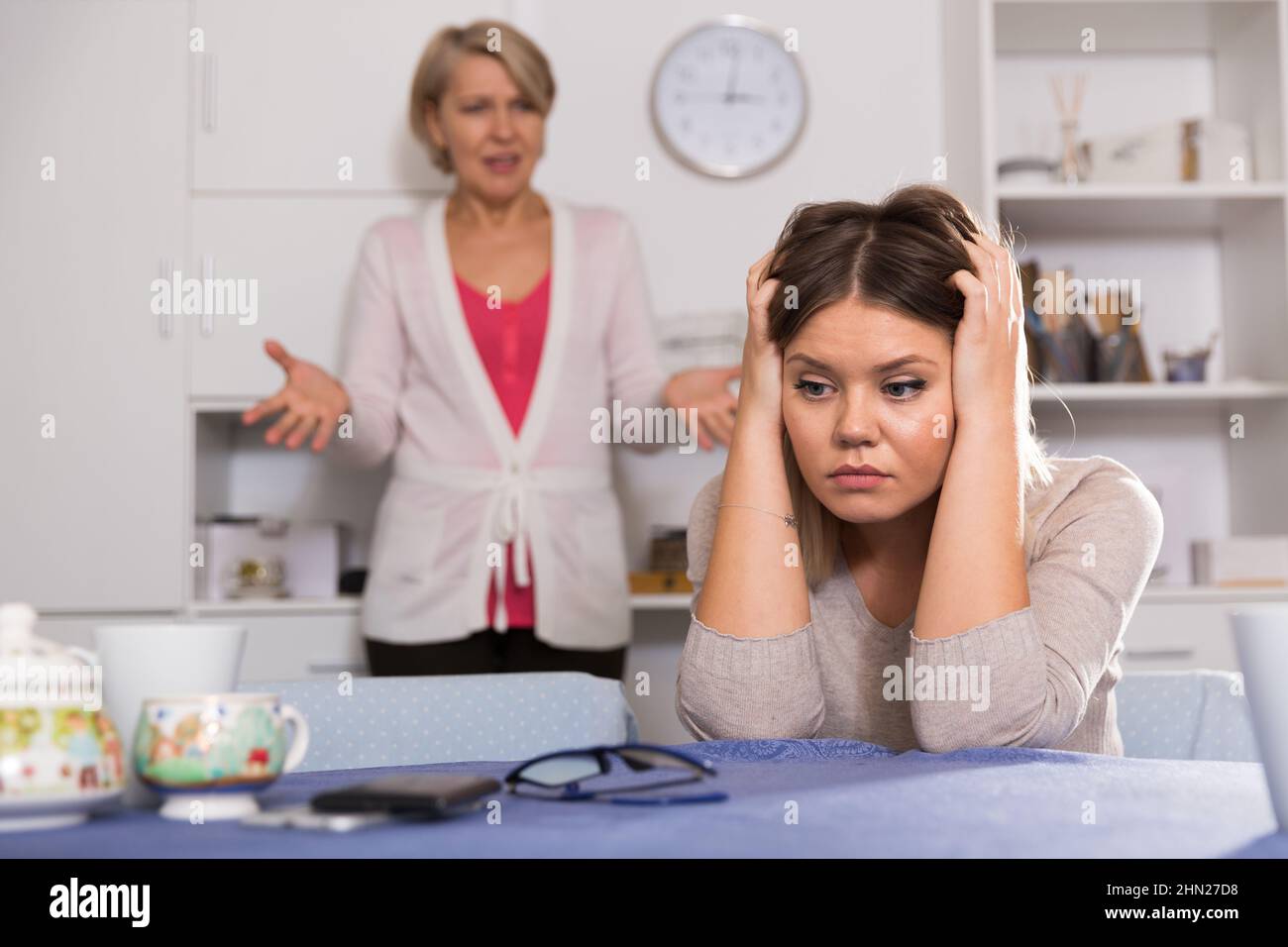Mother scolds her adult daughter Stock Photo - Alamy