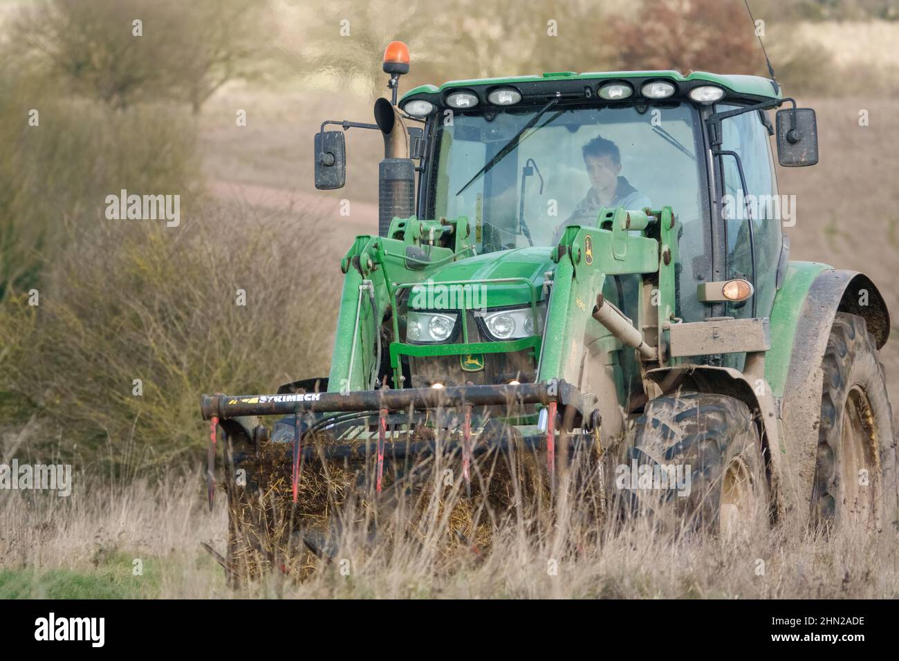 John Deere 6150R farm tractor with H360 front end loader Stock Photo ...