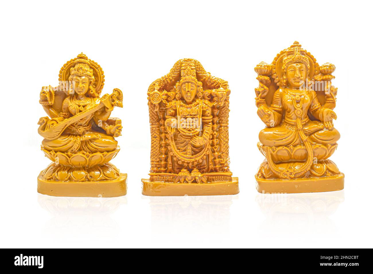 The wood carved idols of Mahalakshmi, Saraswati and Venkateswara Swamy ...