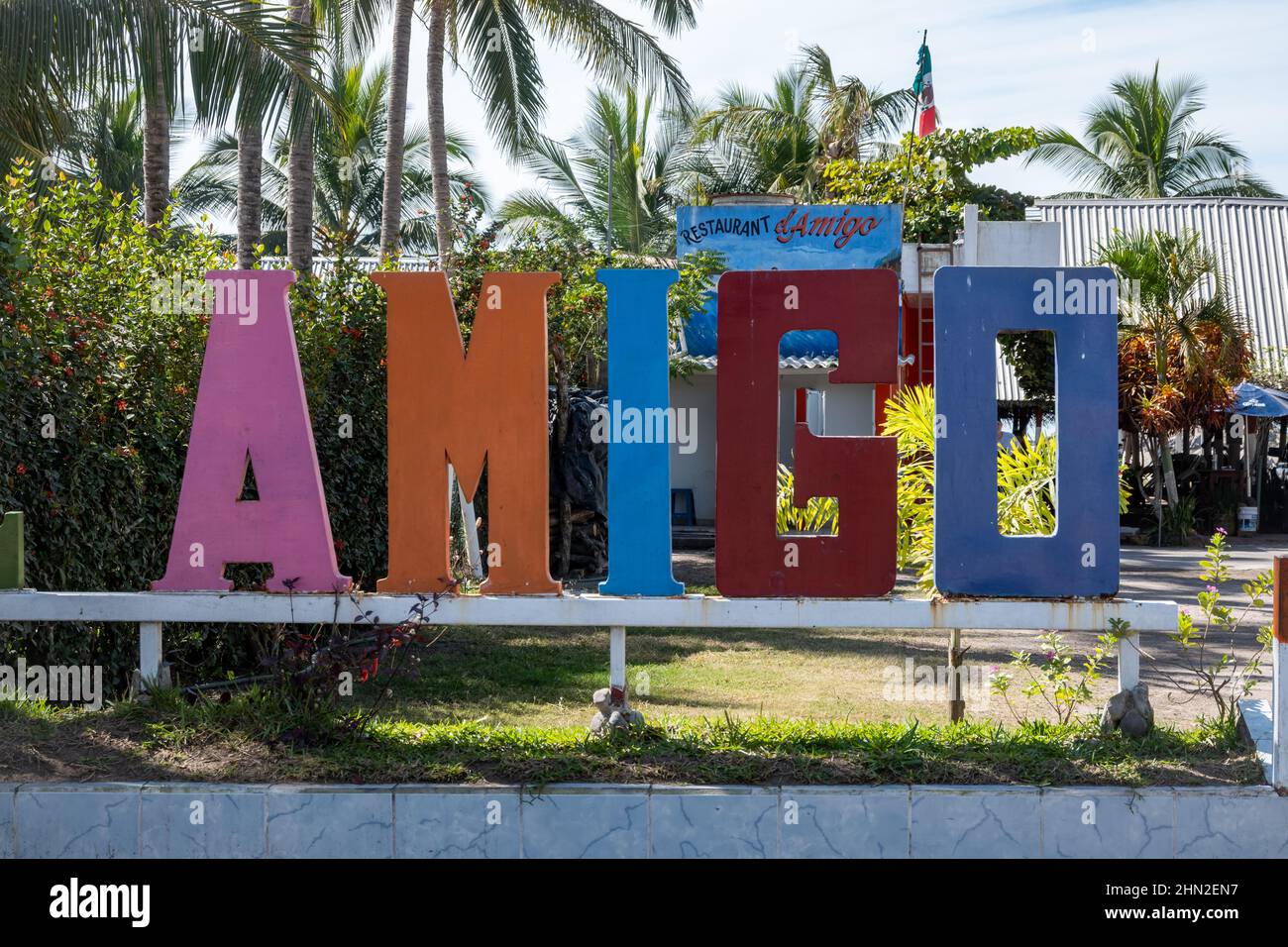 A giant colorful "Amigo" sign in front of a restaurant. San Blas ...