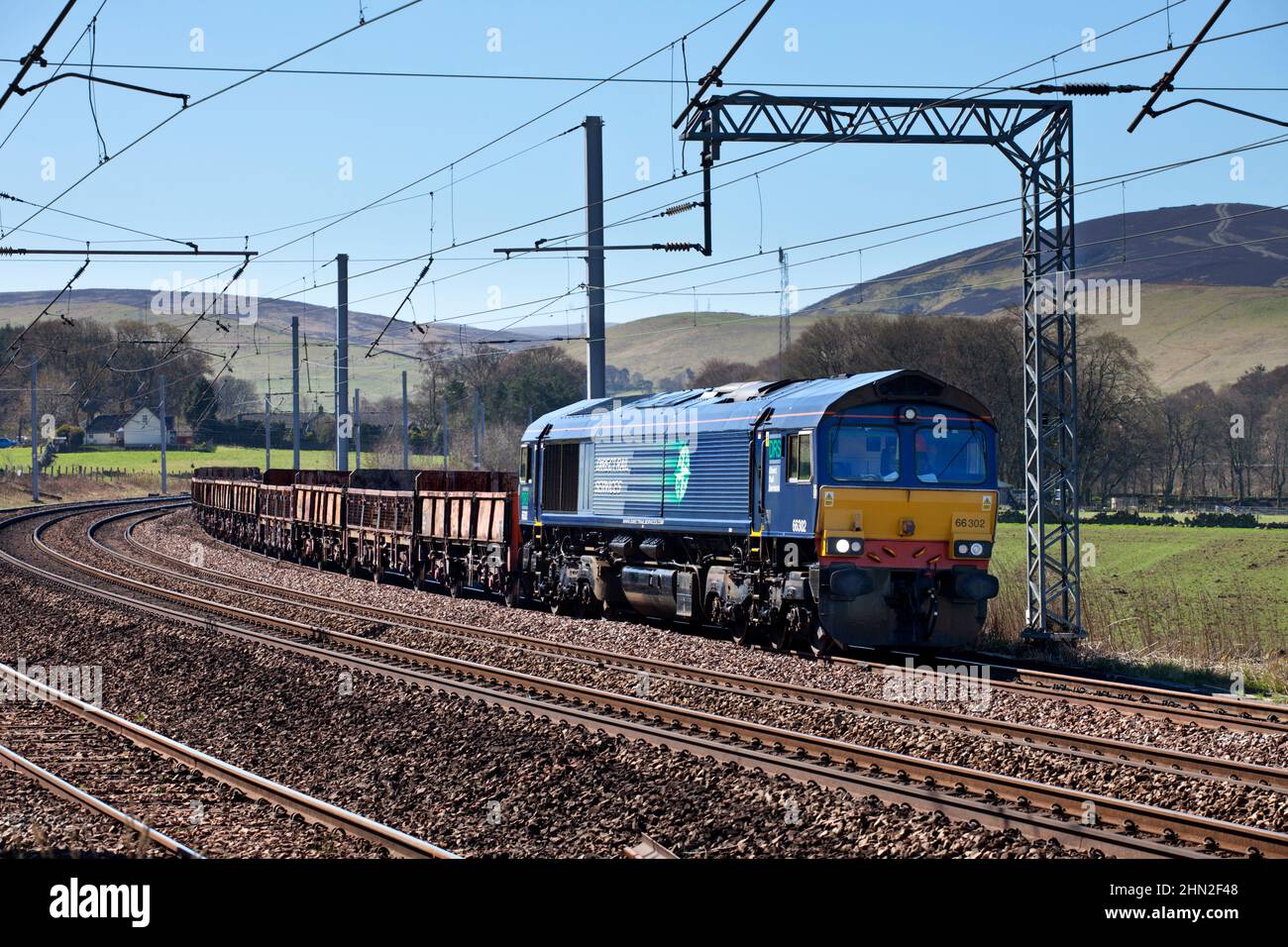 Direct rail Services class 66 locomotive with a freight train waiting in Abington loops, on the ...