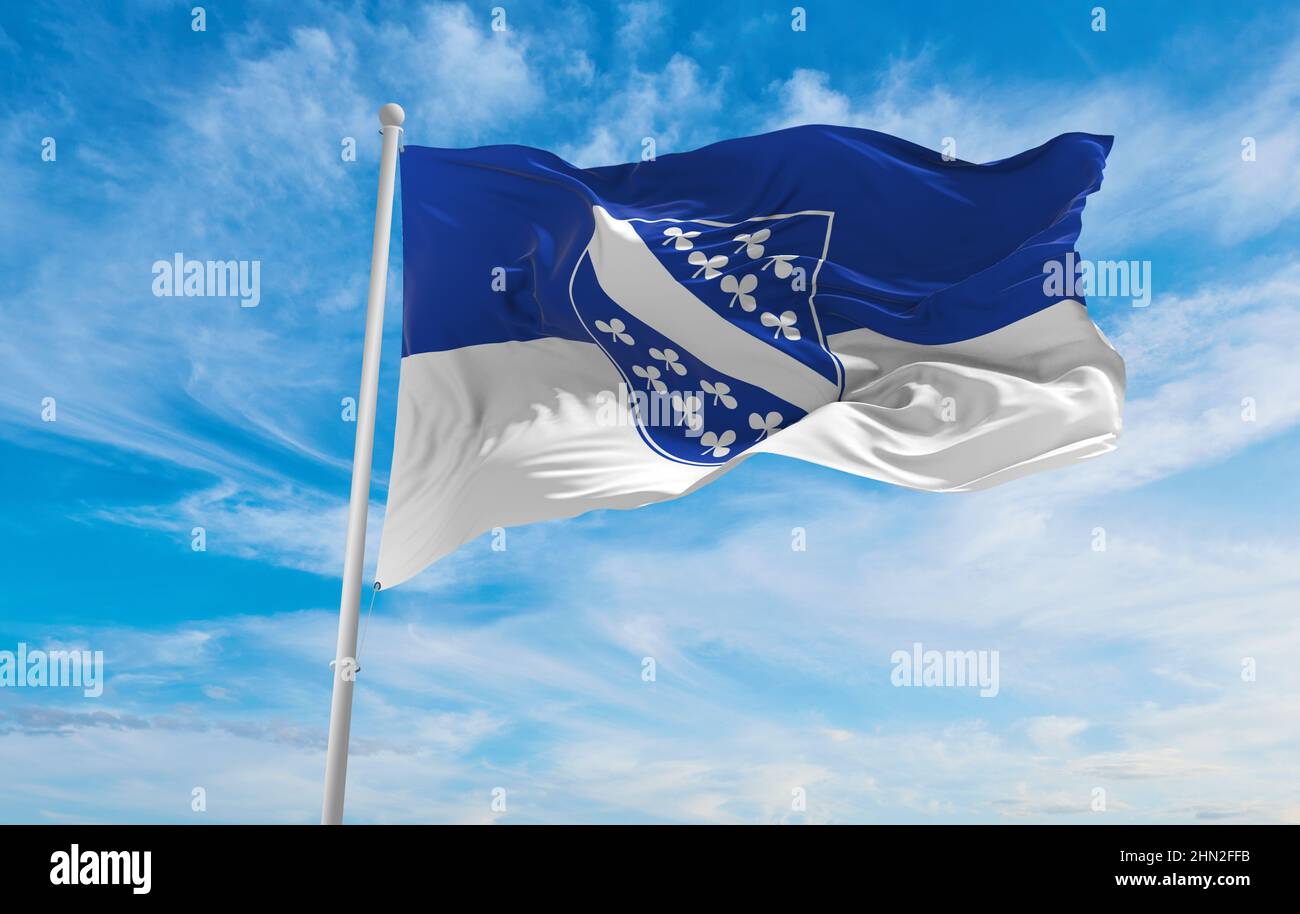 flag of Kassel at cloudy sky background on sunset, panoramic view ...