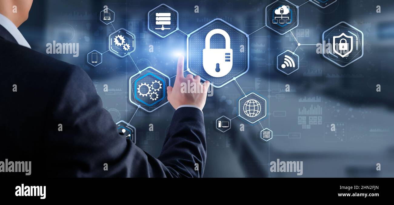 Businessman presses cybersecurity button on virtual screens Stock Photo ...