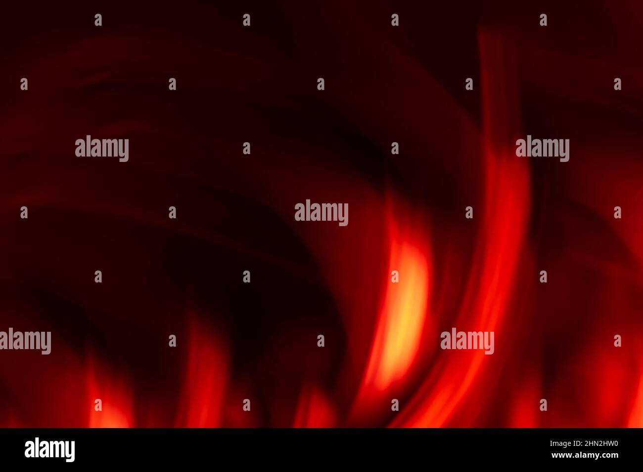 Abstract hot shiny red flame on black background. Soft blur. Backdrop ...