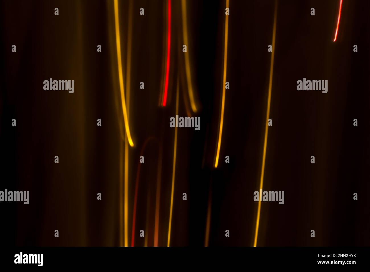 Abstraction, frozen in time, multicolored rays falling from top to ...