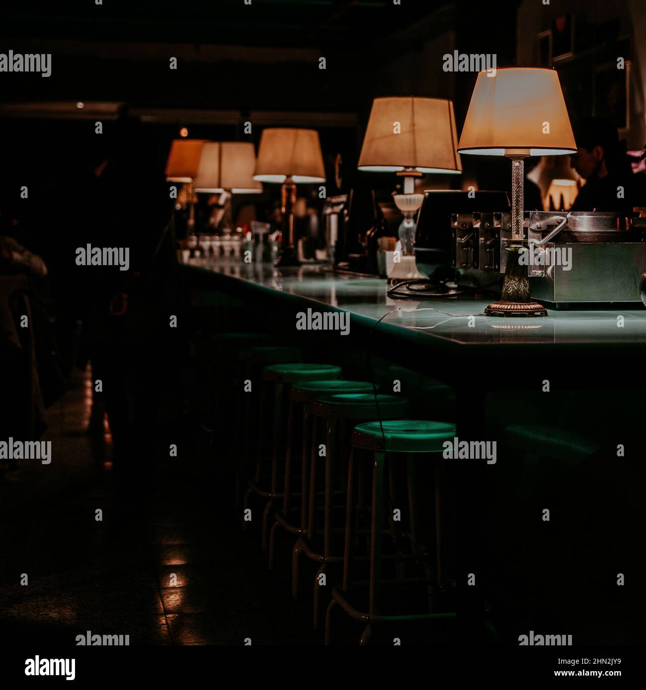 Closeup of lamps on a bar counter Stock Photo - Alamy