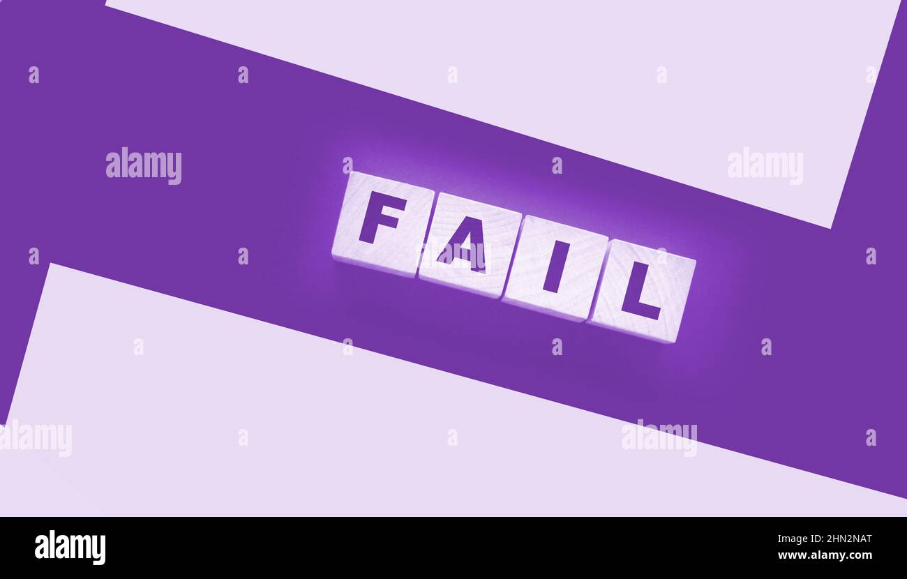 FAIL Word text Written In Wooden Cube blocks on black background ...