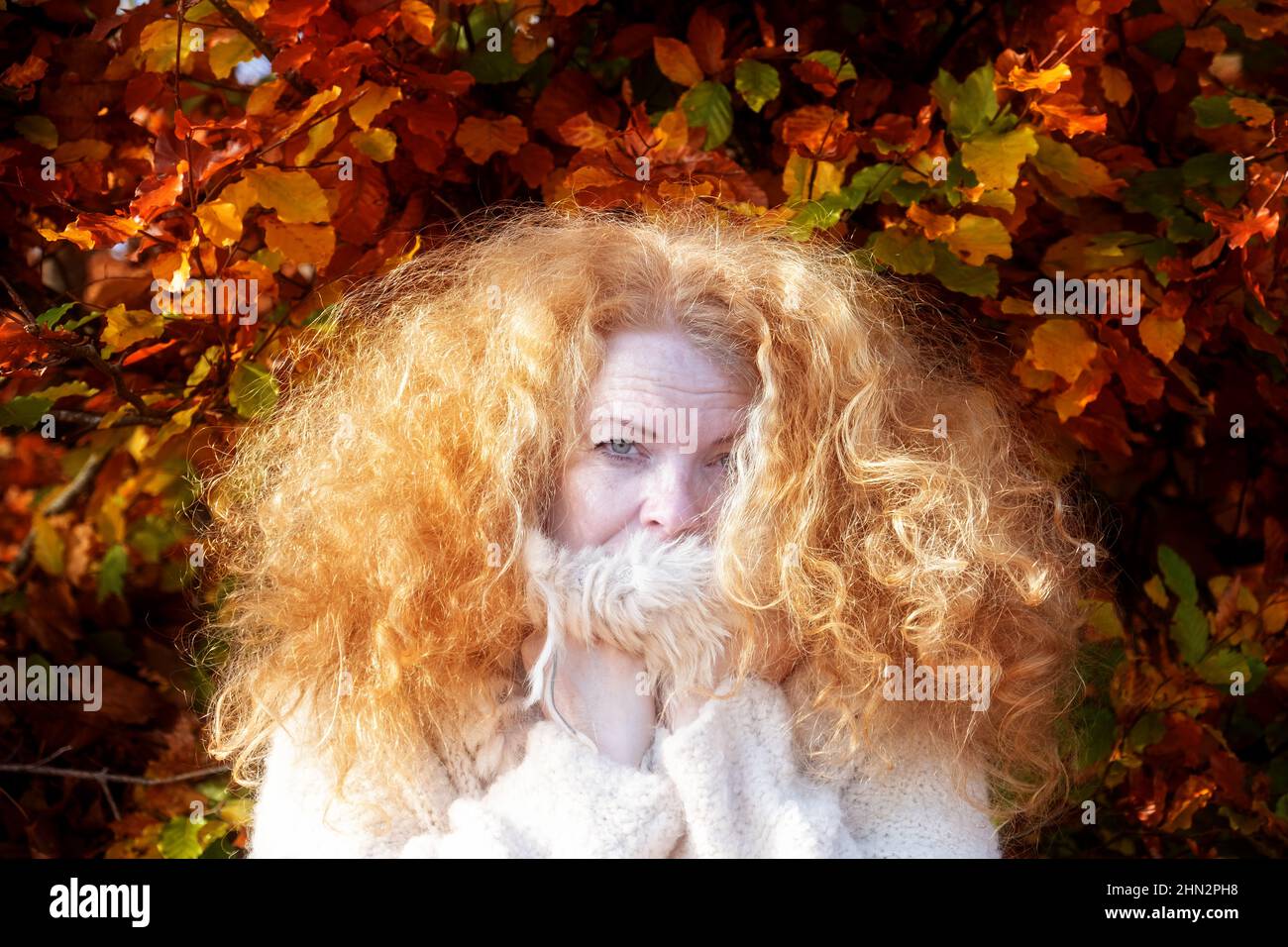 happy red-haired mature woman ginger redhead, in her best years with ...