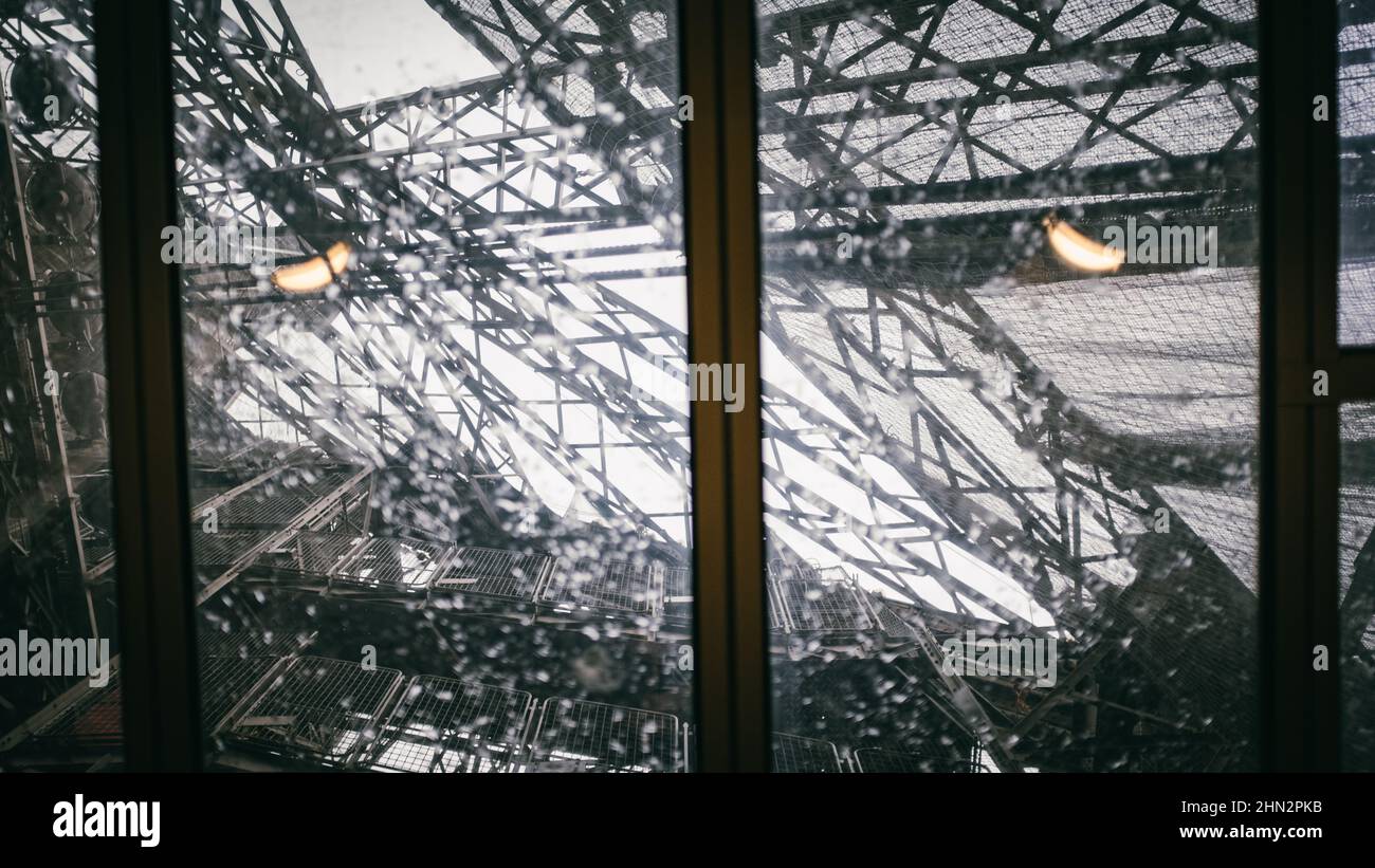 rain drops falling on a glass roof on a metal elevator Stock Photo - Alamy