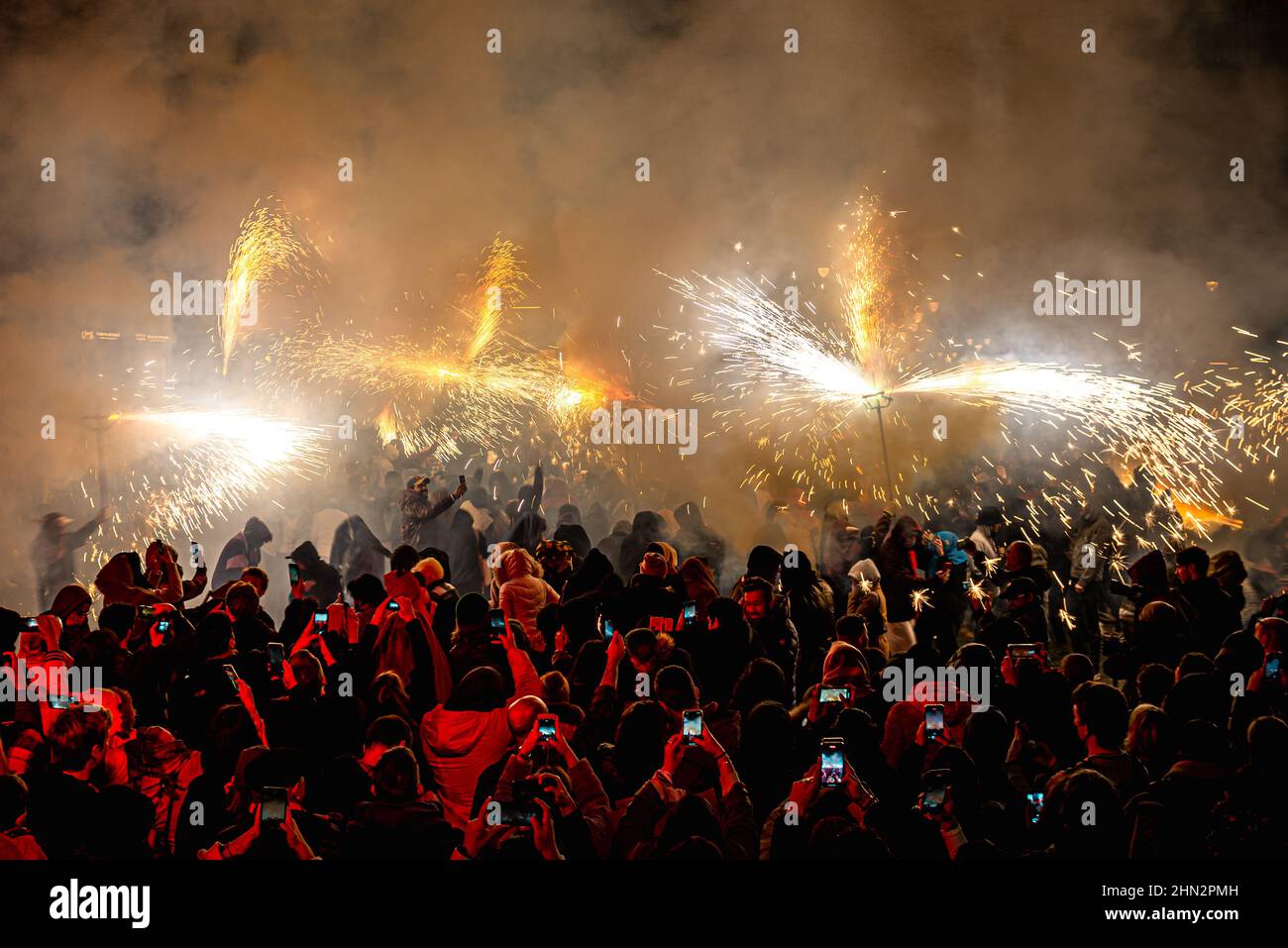 Barcelona, Spain. 13th Feb, 2022. Fire runners in devil costumes set of ...
