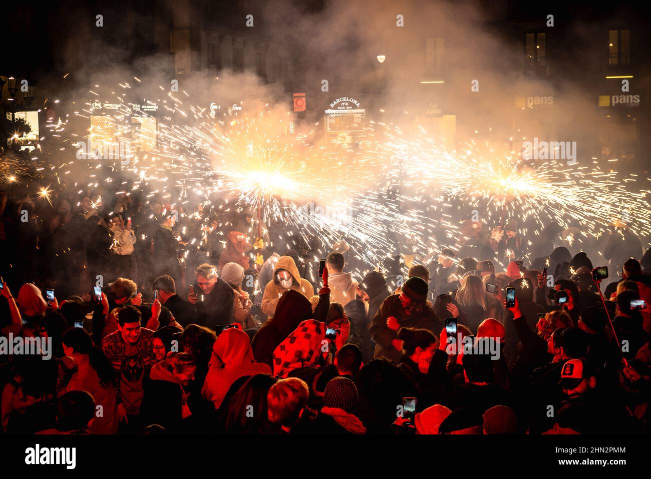 Barcelona, Spain. 13th Feb, 2022. Fire runners in devil costumes set of ...