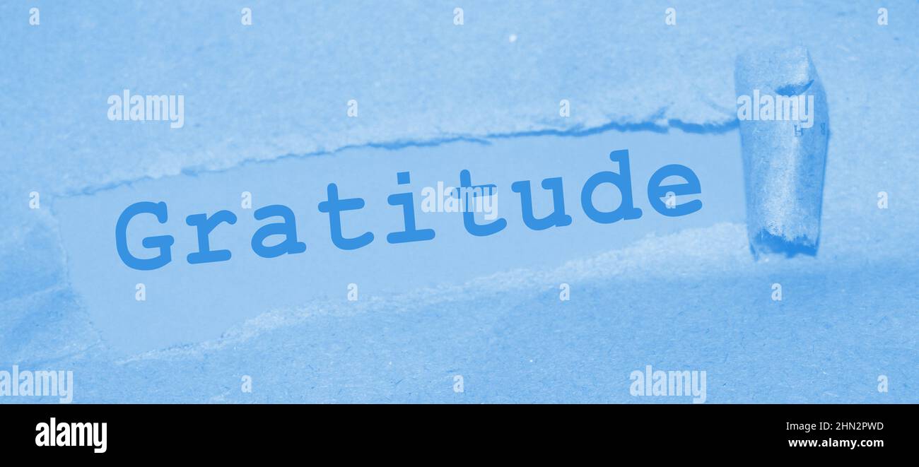 Word Gratitude appearing behind torn ripped brown paper Stock Photo - Alamy