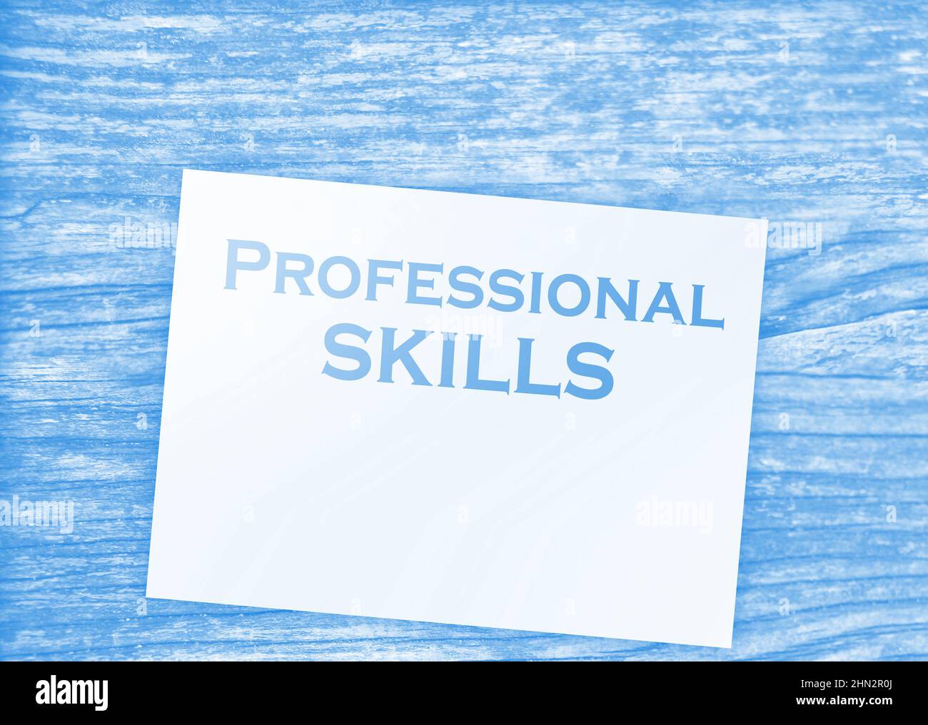 Professional Skills text on page and paper dollar signs around on ...