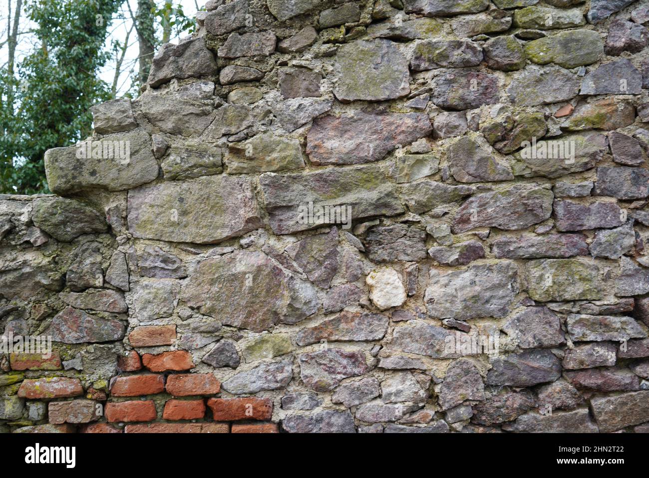 Stone wall of a ruined building Stock Photo - Alamy