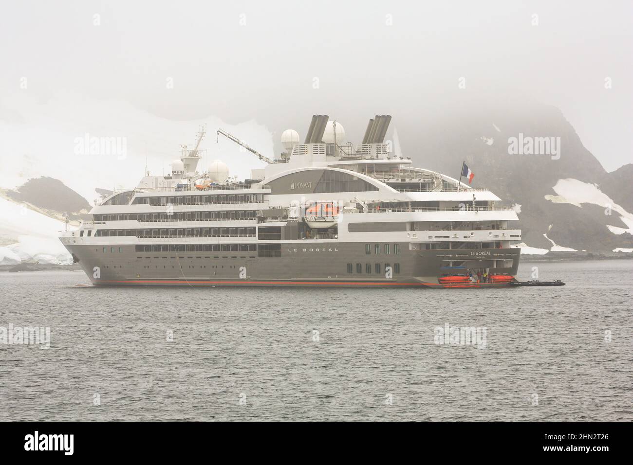 Le Boreal cruise ship anchored in the bay at Half Moon Island ...