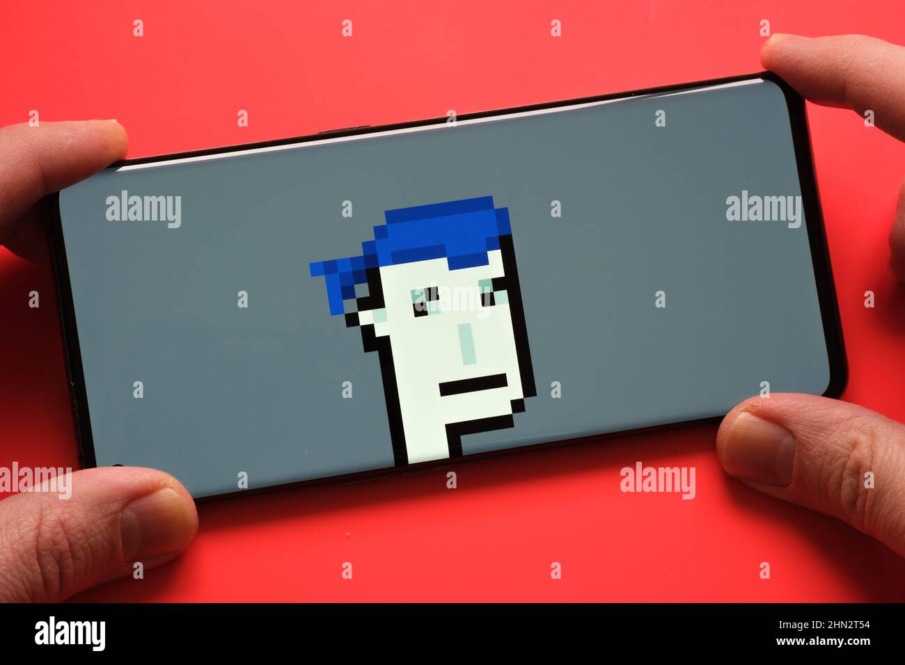 NFT Cryptopunk 5822 form Larva Labs seen on the screen of smartphone ...