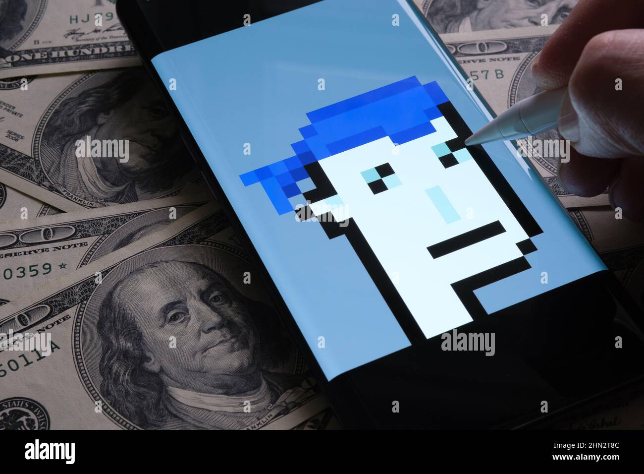 NFT Cryptopunk number 5822 form Larva Labs seen on the screen of mobile ...