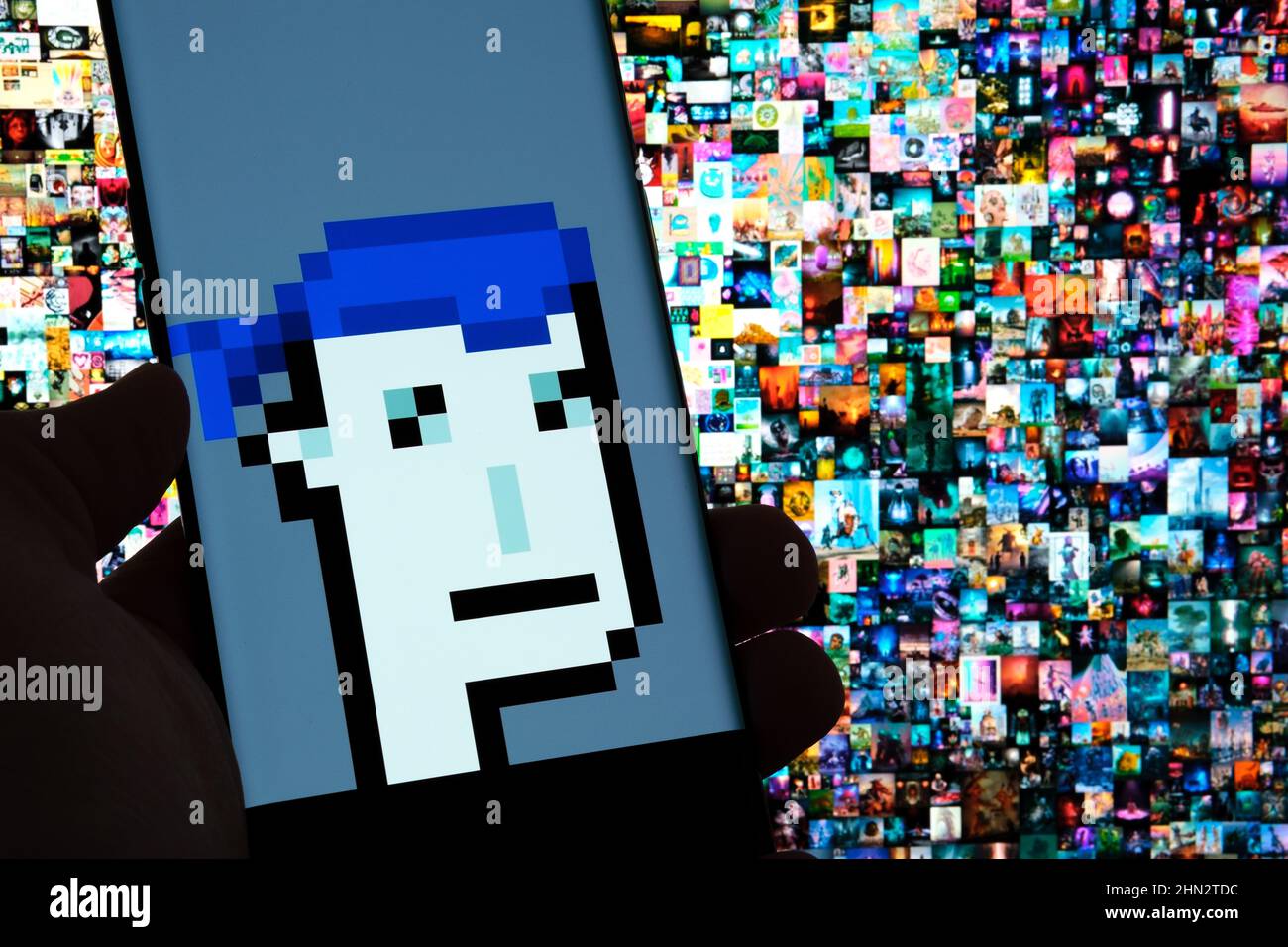 NFT Cryptopunk 5822 form Larva Labs seen on the screen of mobile device ...