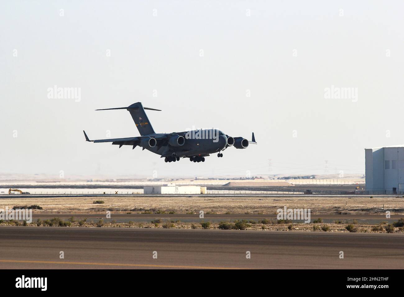 A C-17 Globemaster III lands at Al Dhafra Air Base, United Arab ...