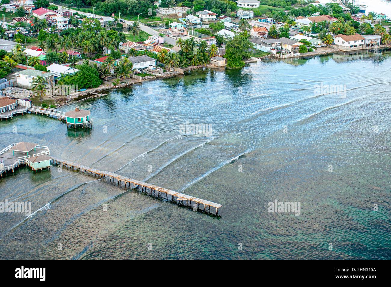 An aerial view of an affluent part of Roatan island shows the beautiful ...
