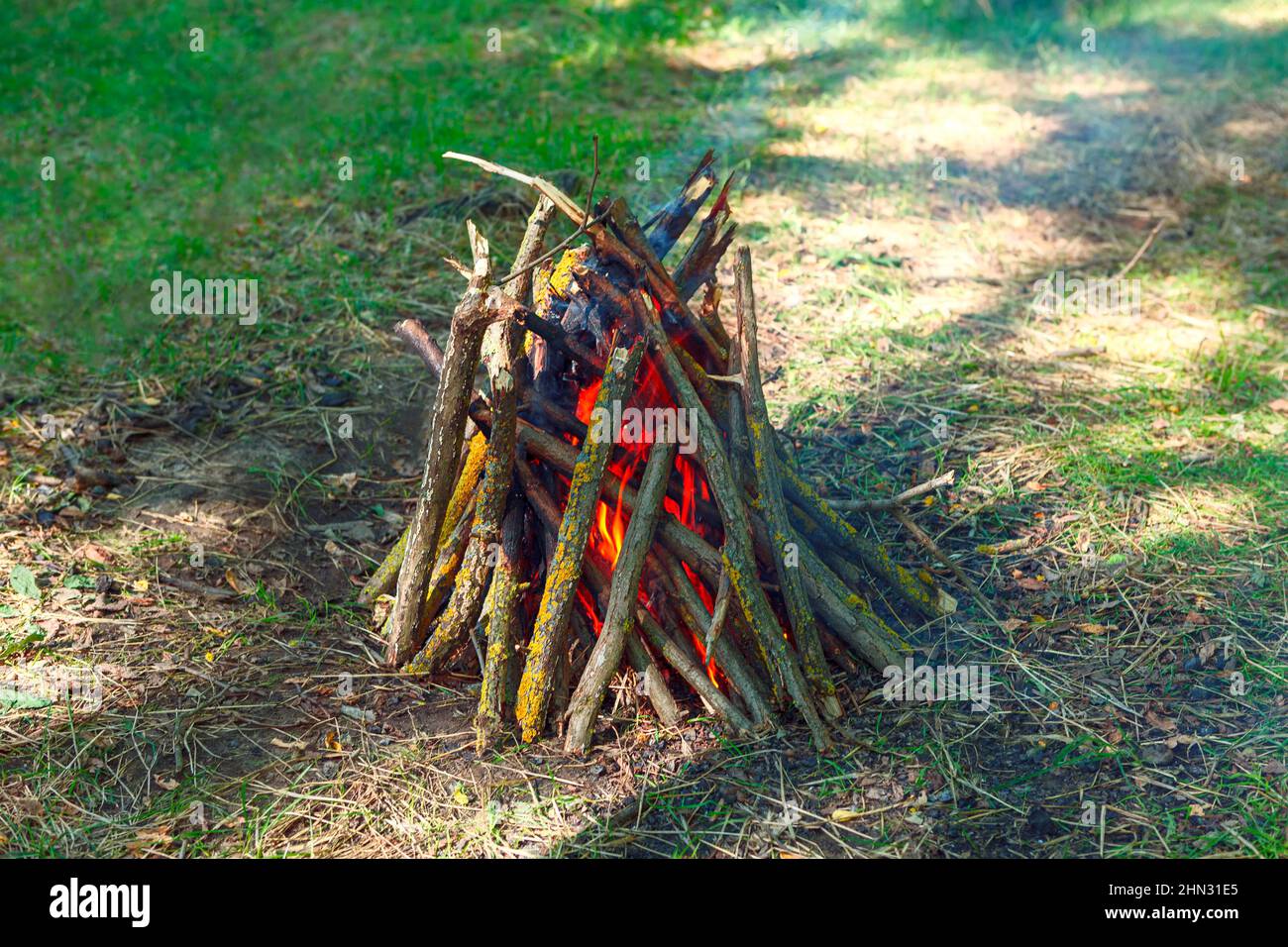 Campsite with fire . Campfire for picnic Stock Photo - Alamy