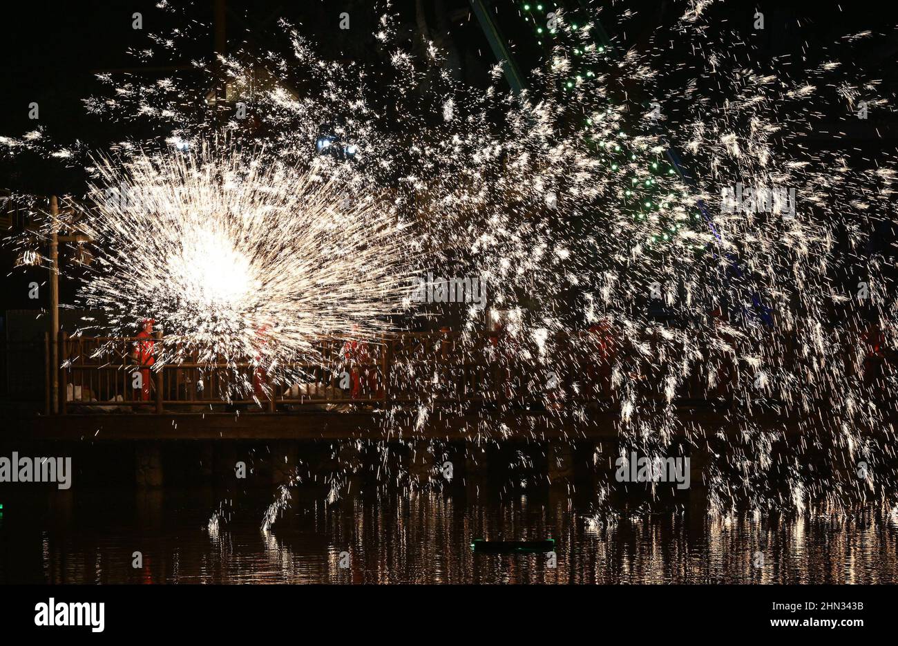 HANDAN, CHINA - FEBRUARY 13, 2022 - Folk artists perform "beating iron ...