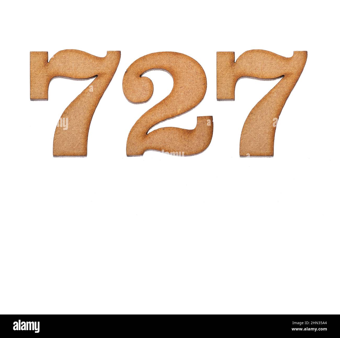Number 727 in wood, isolated on white background Stock Photo - Alamy