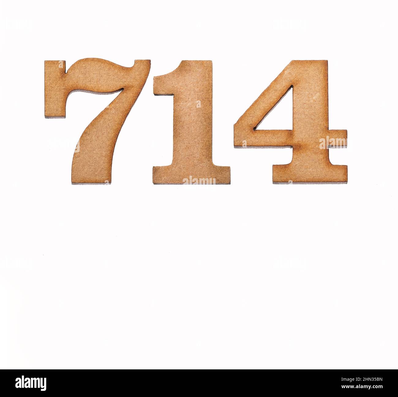 Number 714 - Piece of wood isolated on white background Stock Photo - Alamy