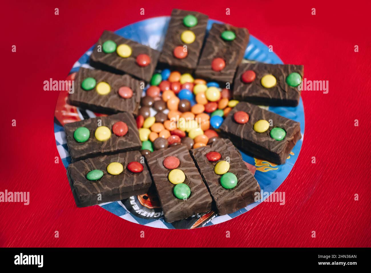 Chocolate car transport thematic cookies cakes with colorful candies as ...