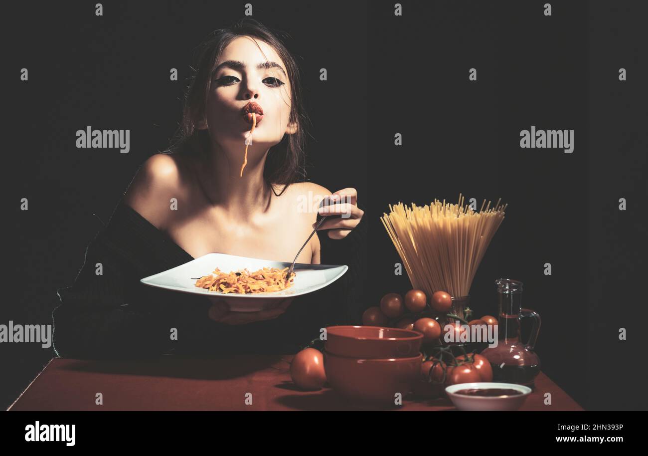 Sensual woman eat spaghetti. Italian girl eats spaghetti pasta Stock ...