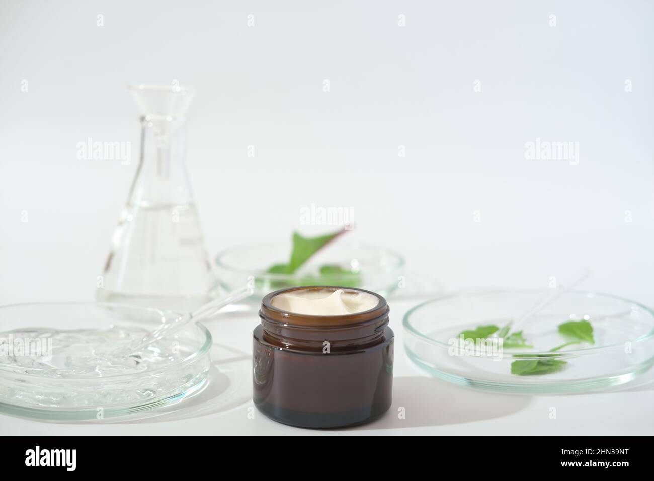 laboratory developed cream with natural ingredients. lab glassware ...
