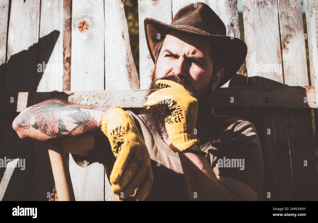 Portrait of Farmer in the farm on countryside background. Rural scene ...