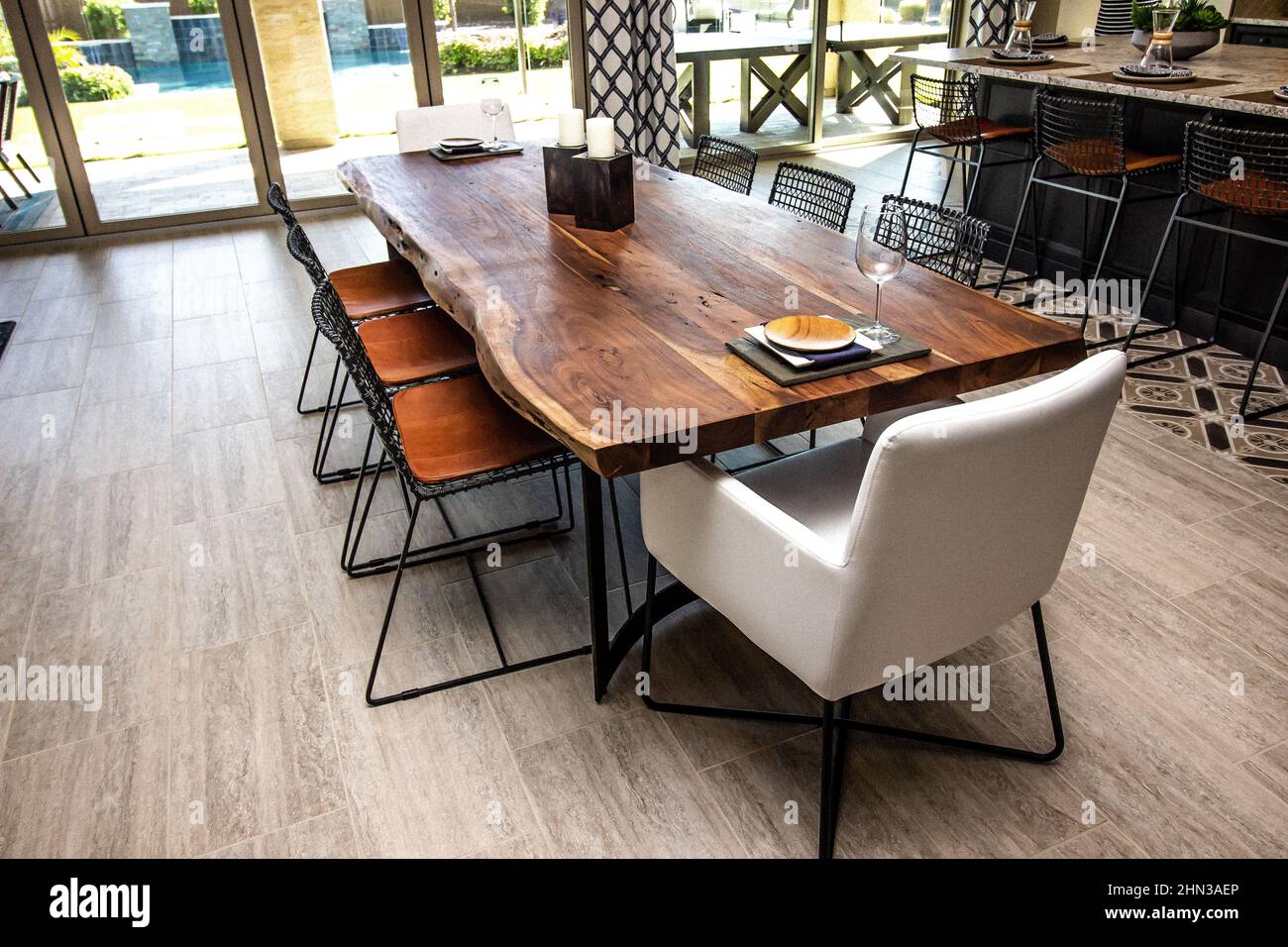 Unique Shaped Wooden Dining Area Table With Eight Chairs Stock Photo ...
