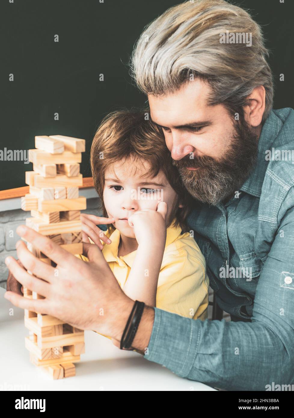 Private child tutor. After school teaching. School kids Stock Photo - Alamy