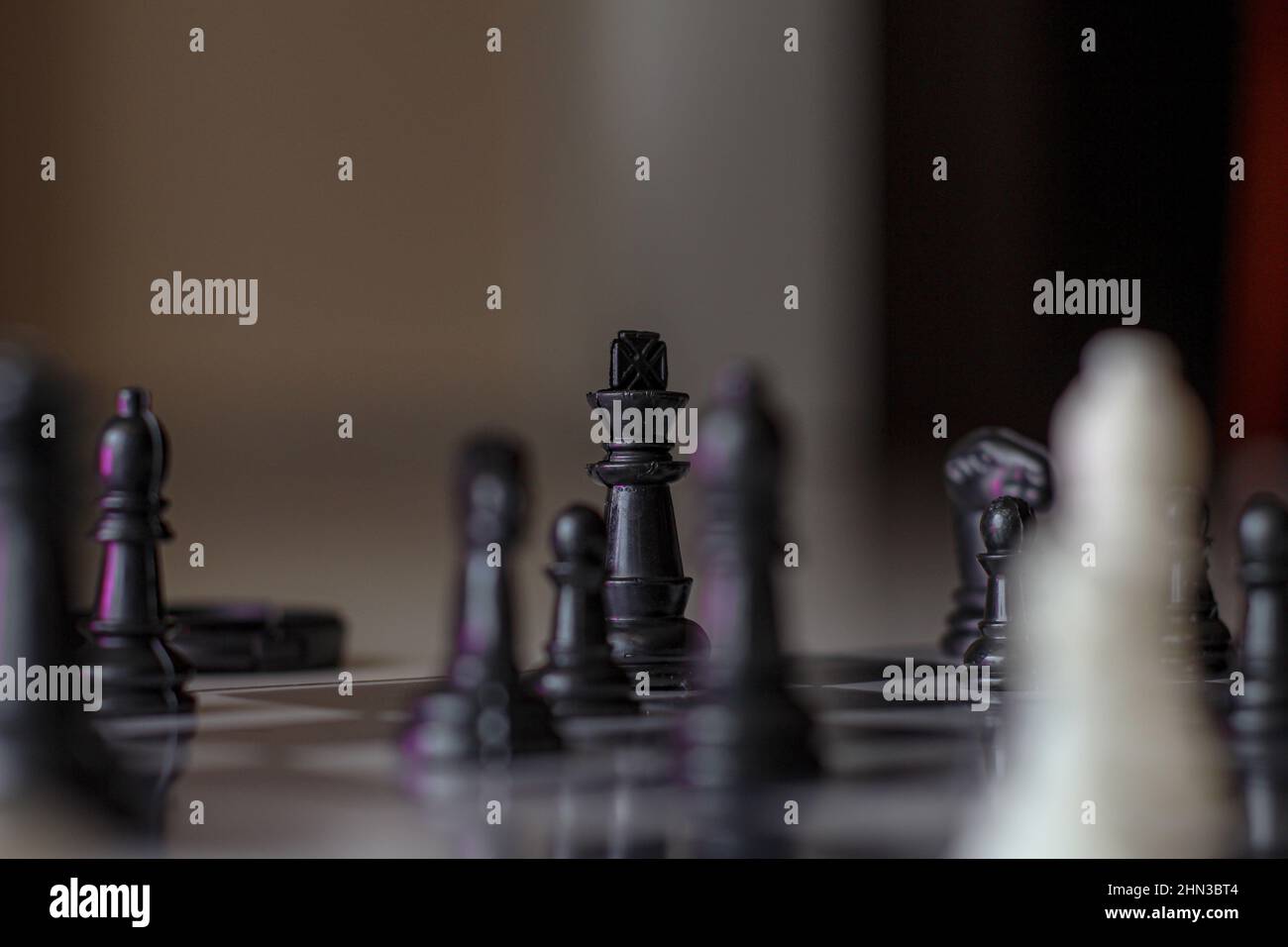 Selective focus of chess pieces on the chessboard on the table with a ...