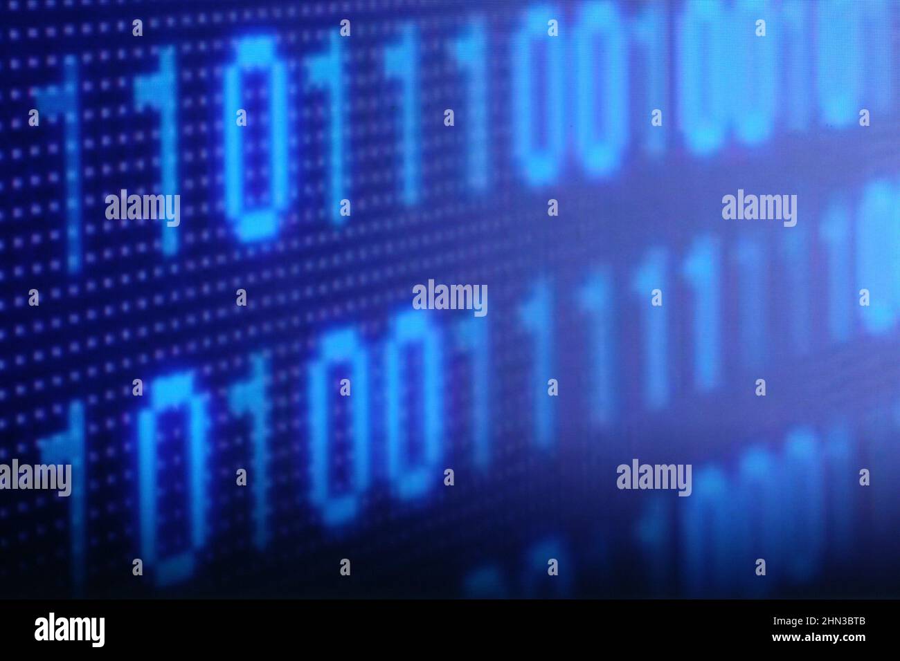 Illustration of running binary codes on a blue blurry background Stock Photo - Alamy