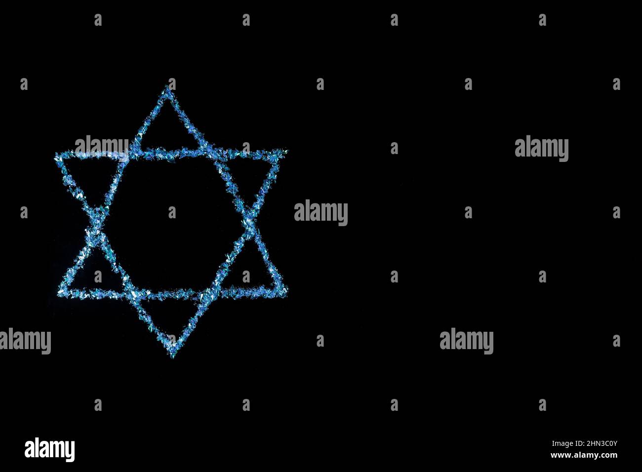 Blue star of David. Jewish symbol on black background Stock Photo - Alamy