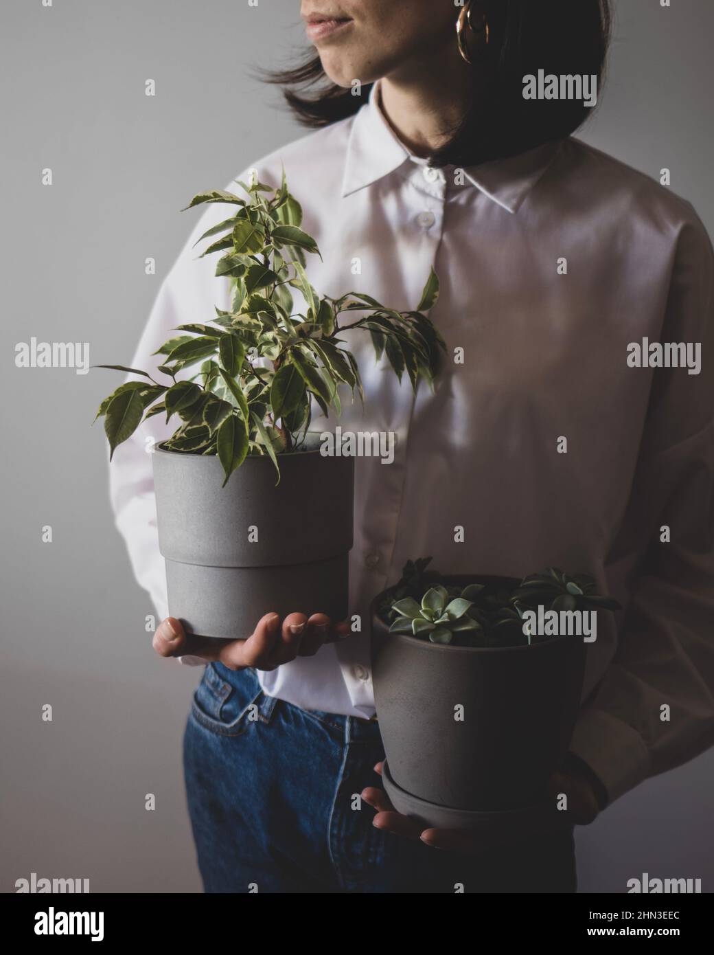 Balancing plant pot hi-res stock photography and images - Alamy