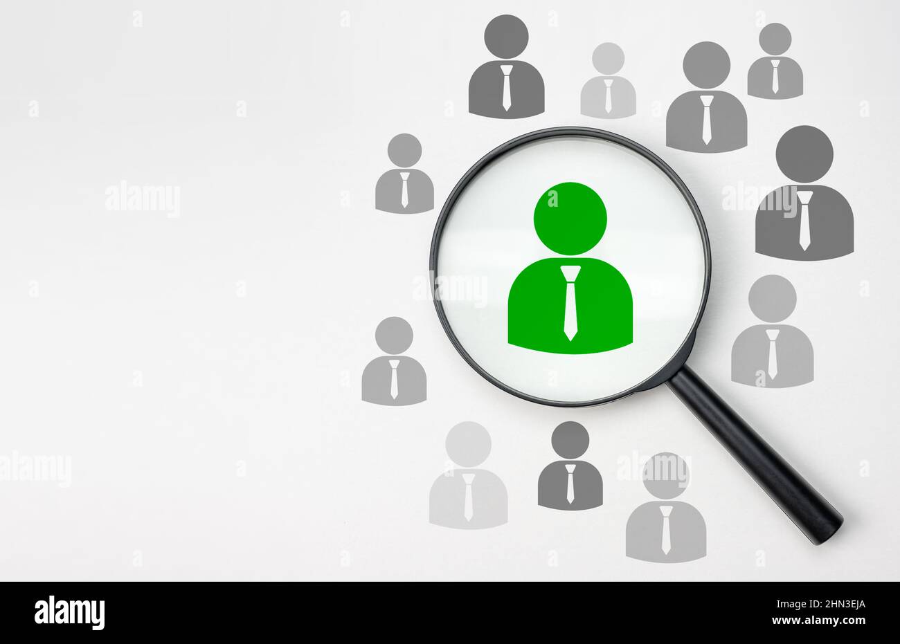 Searching for new team member. Male employer holding magnifier in hand ...