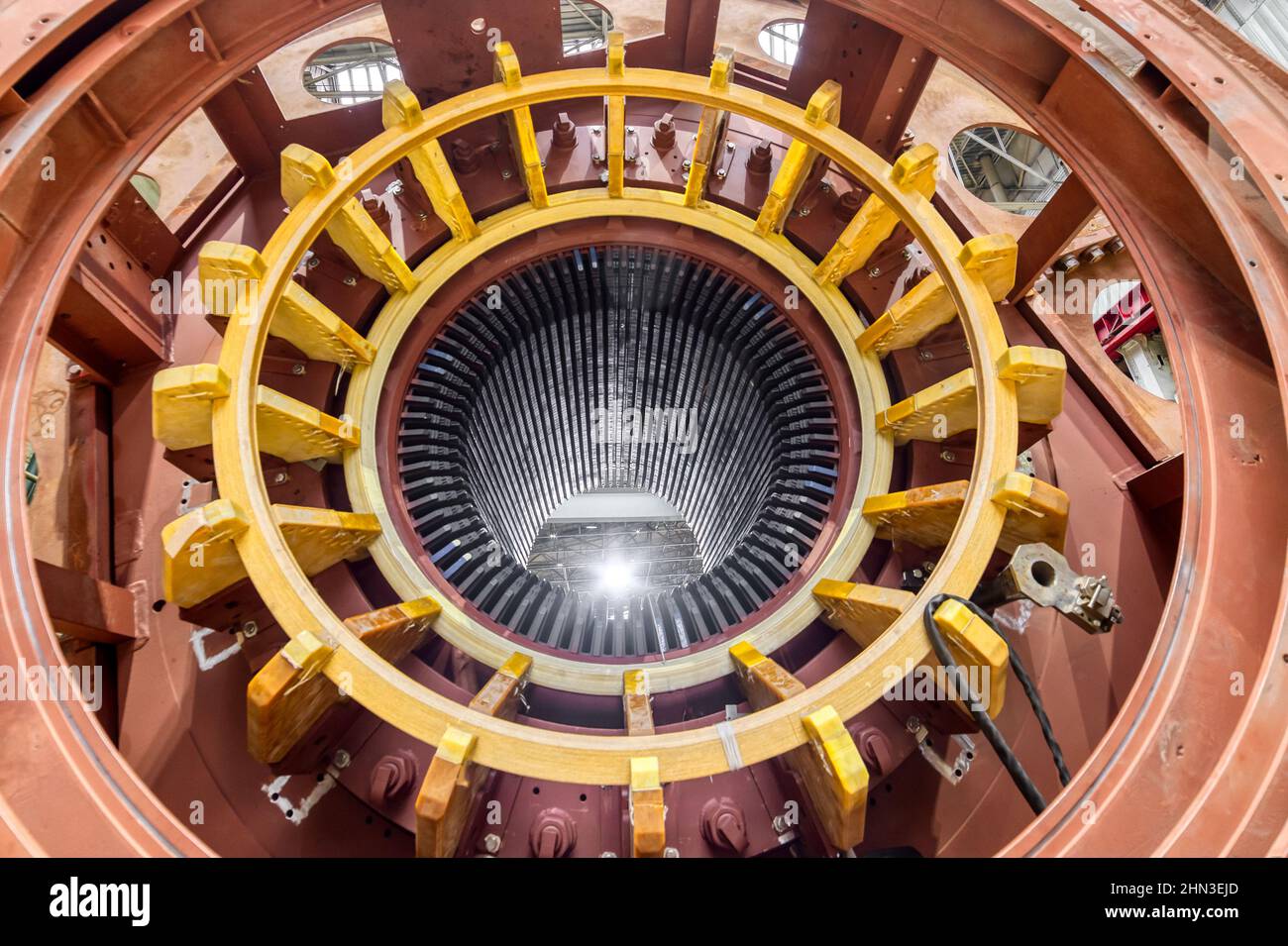 Large electric motor with color details in plant workshop Stock Photo ...