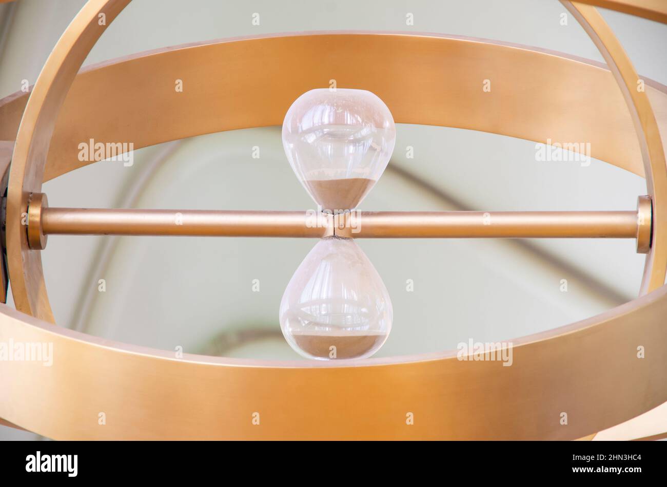 An hourglass is the simplest device for counting time, consisting of ...