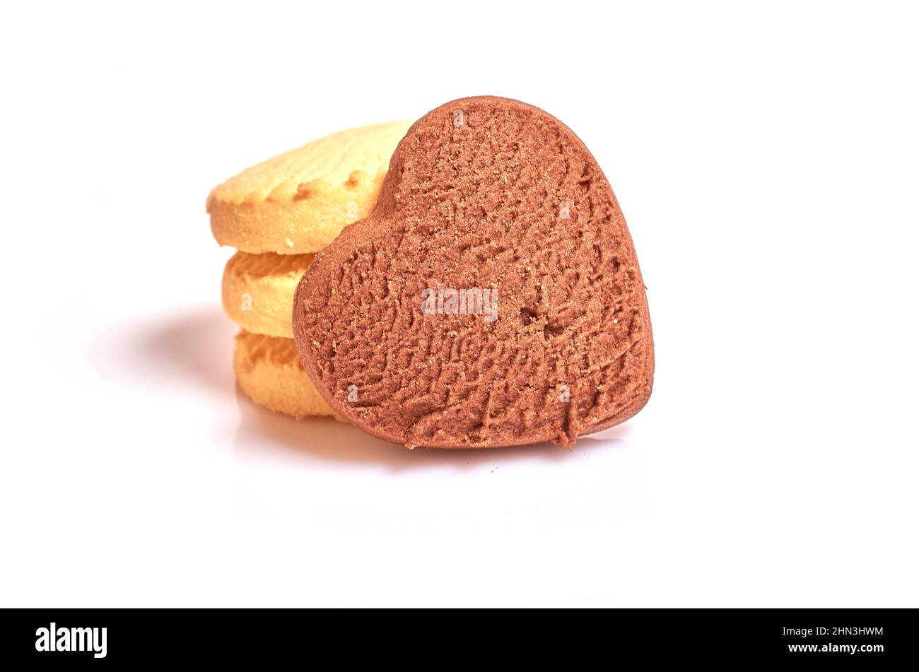 Three lemon cookies and one chocolate heart-shaped Stock Photo - Alamy