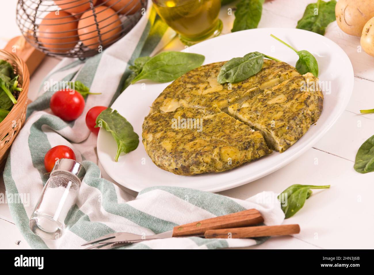 Spanish omelette with spinach Stock Photo - Alamy