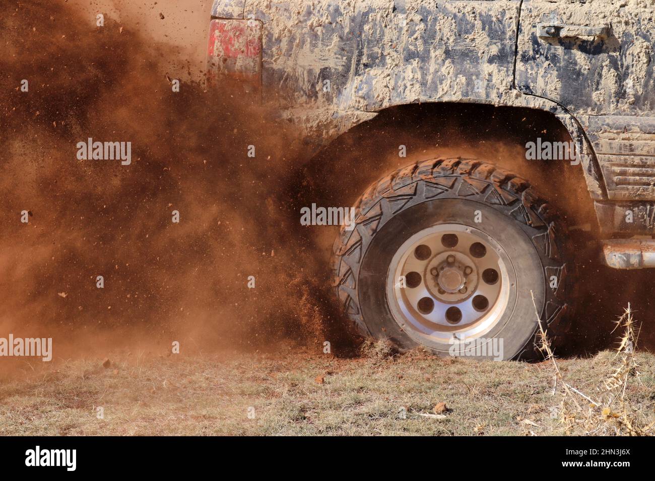 off-road racing on dusty terrain Stock Photo - Alamy