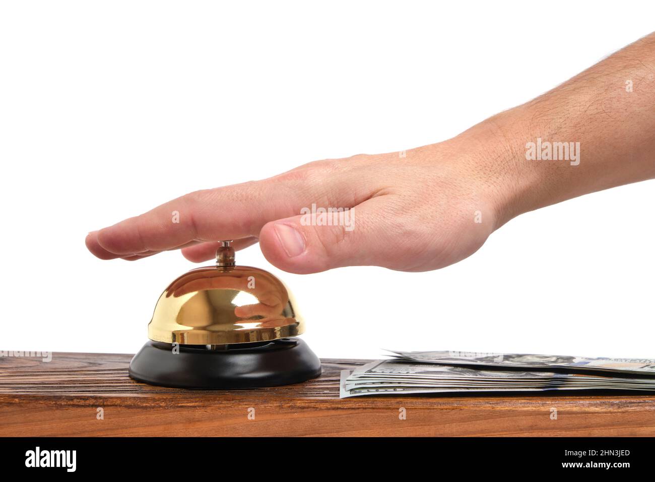 Pressing your hand bell hotel service and dollars table.Concept hotel ...