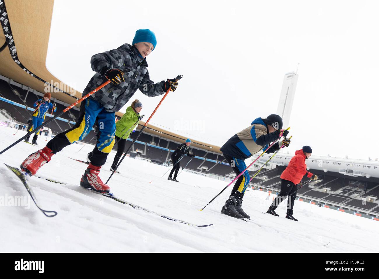 Helsinki, Finland. 13th Feb, 2022. People ski at the Olympic Stadium ...