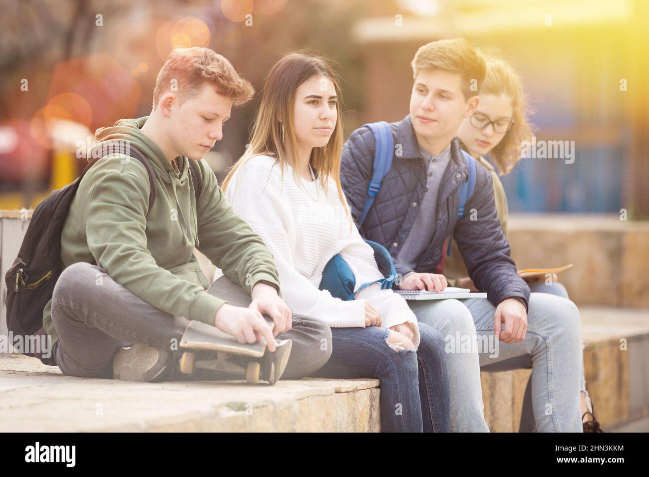 Group of positive teenagers having fun together Stock Photo - Alamy