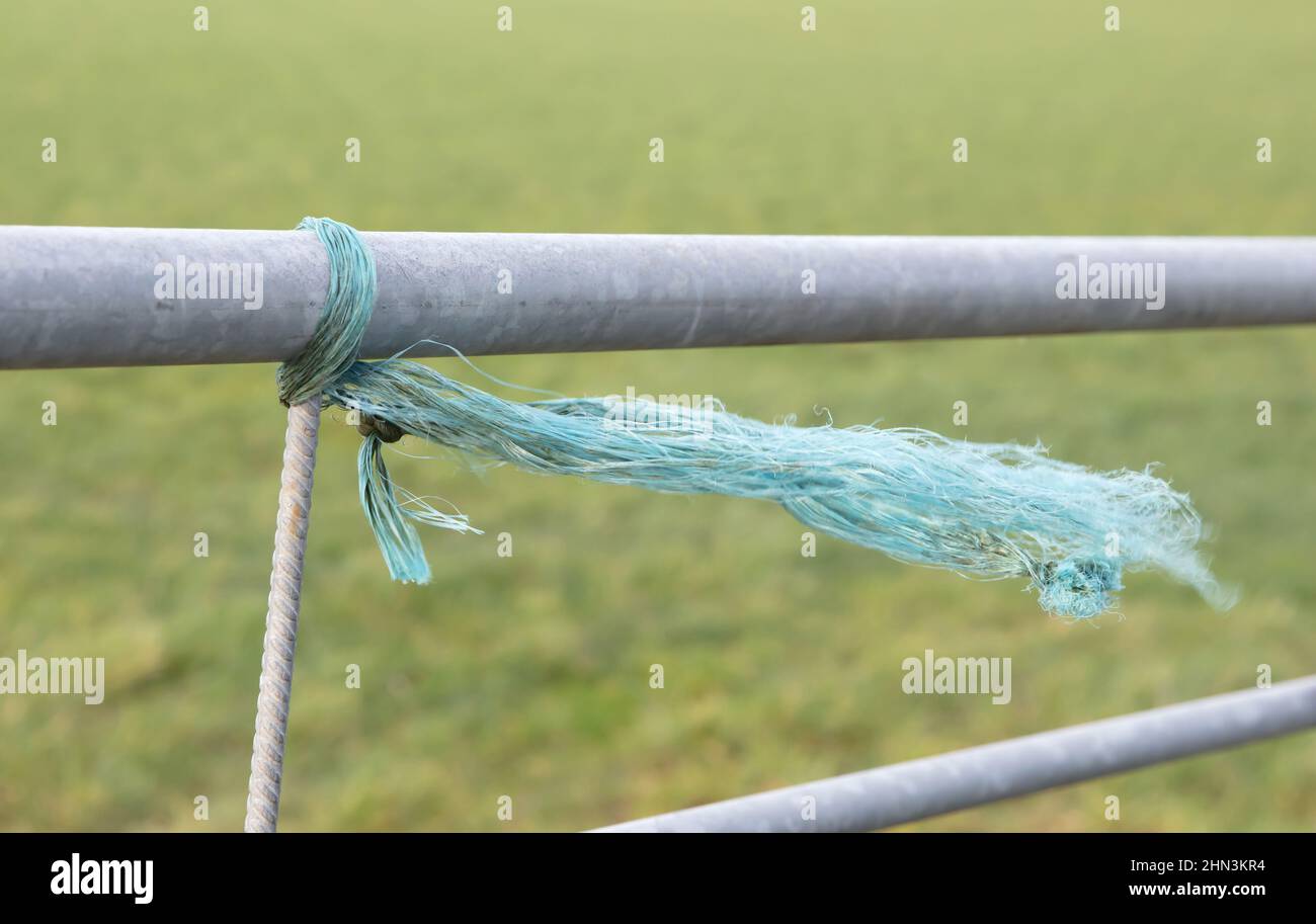 Small rope on a fence, windy day, the Netherlands Stock Photo - Alamy